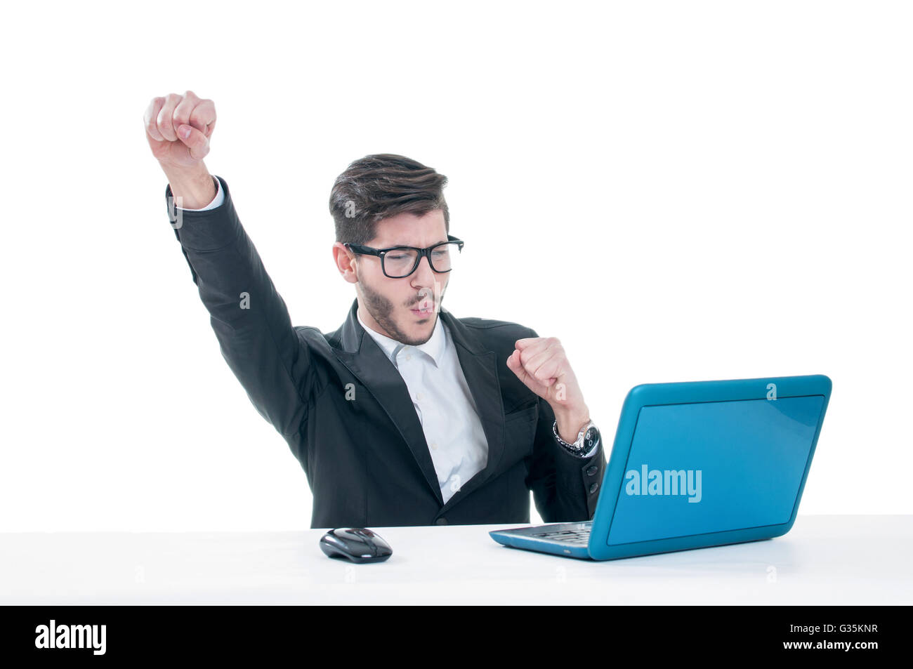 Successful young man celebrating his winning, isolated on white ...