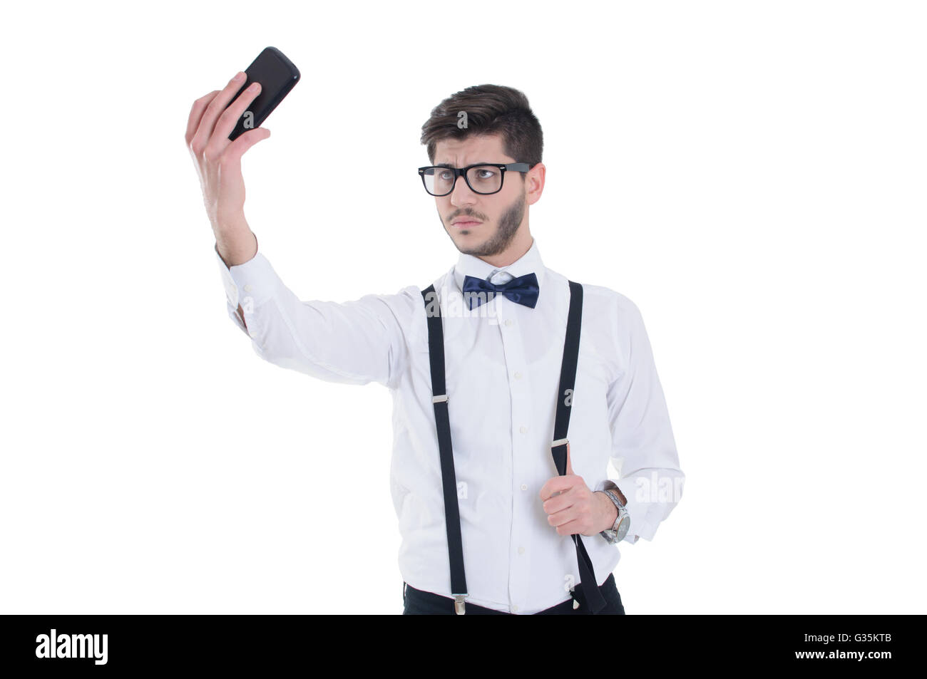 Young man making sad self-portrait isolated on white background Stock ...