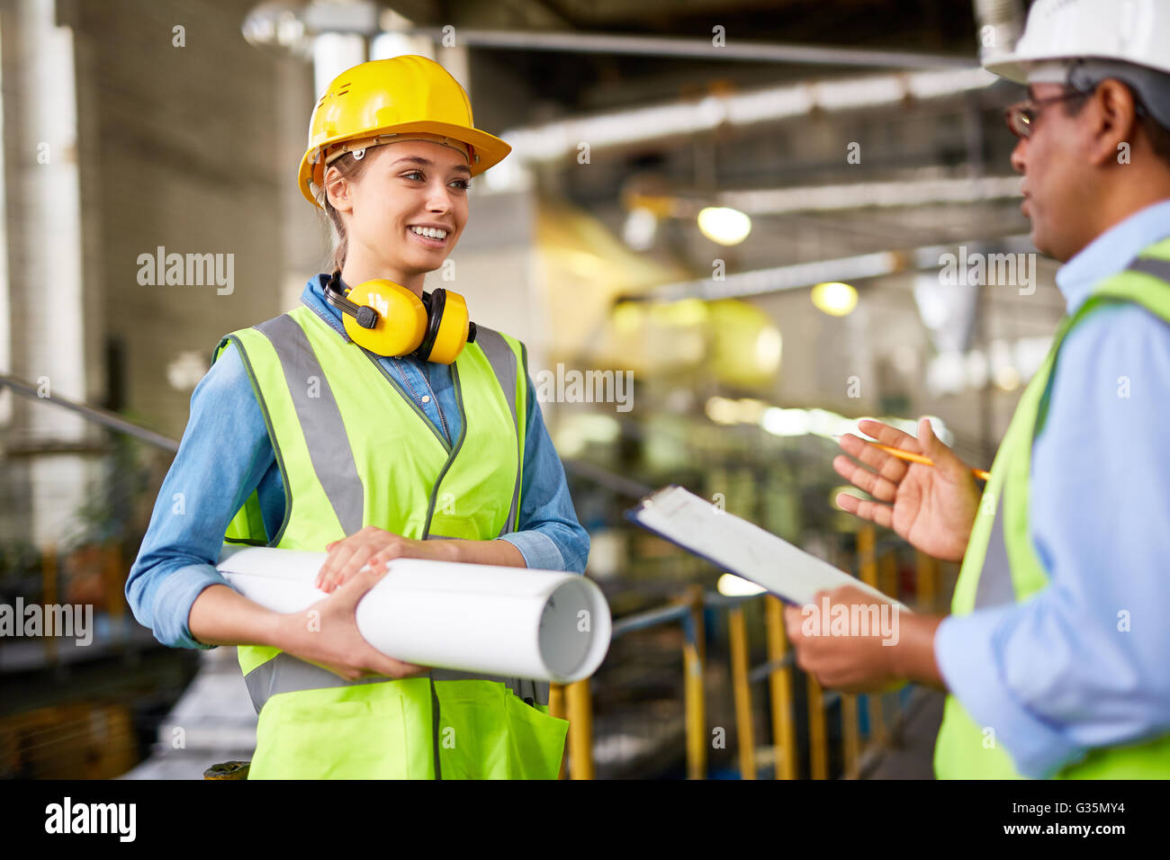 Listening to employer Stock Photo - Alamy