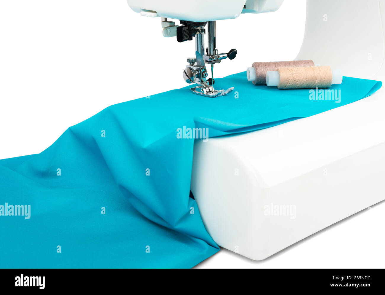 Sewing machine with blue cloth Stock Photo - Alamy