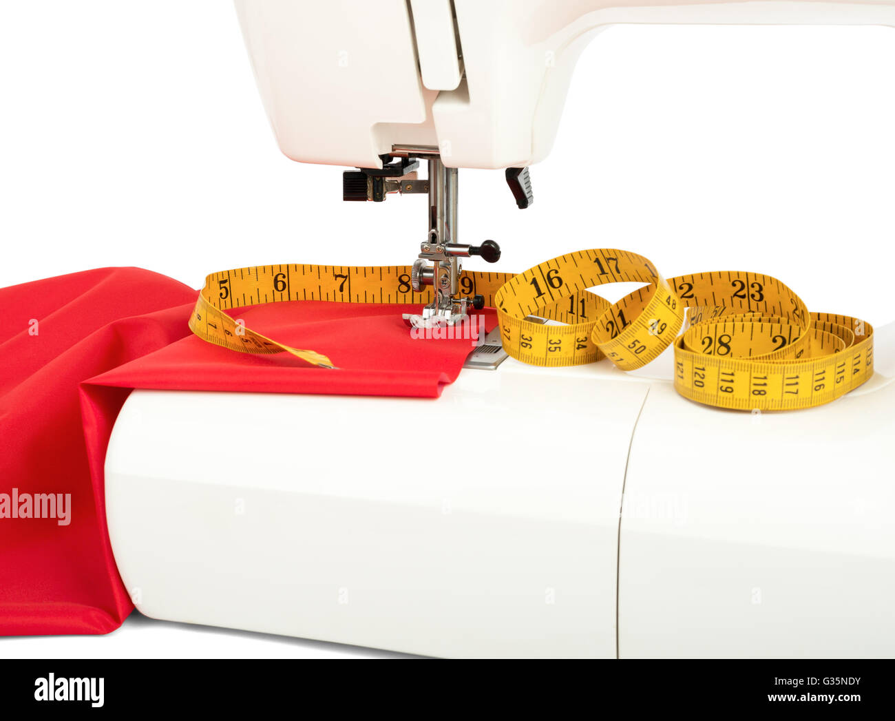 Sewing machine with fabric and tape Stock Photo - Alamy