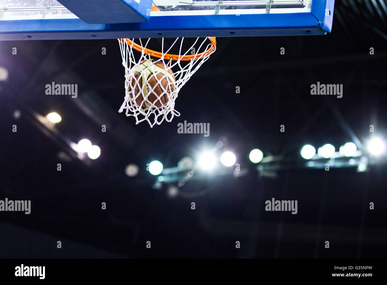 Nba basketball ball through hoop hi-res stock photography and images ...