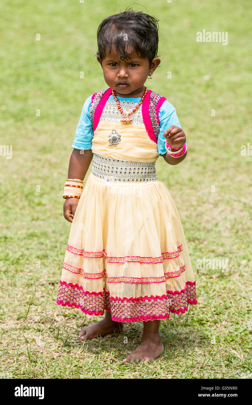 A young girl in Pan Bari Village in the Kaziranga National Park in ...