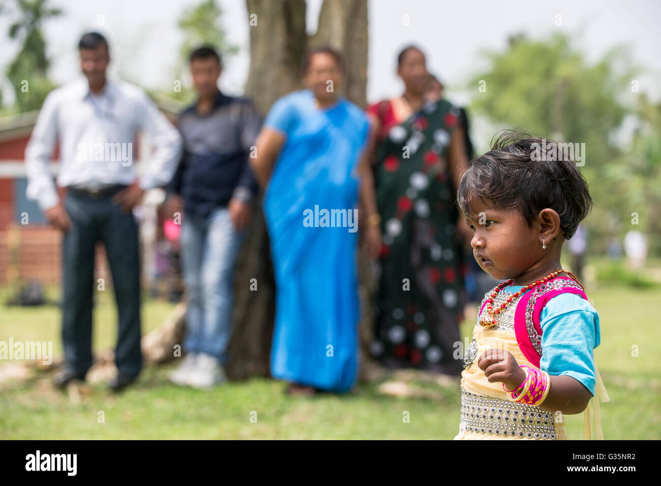 A young girl in Pan Bari Village in the Kaziranga National Park in ...