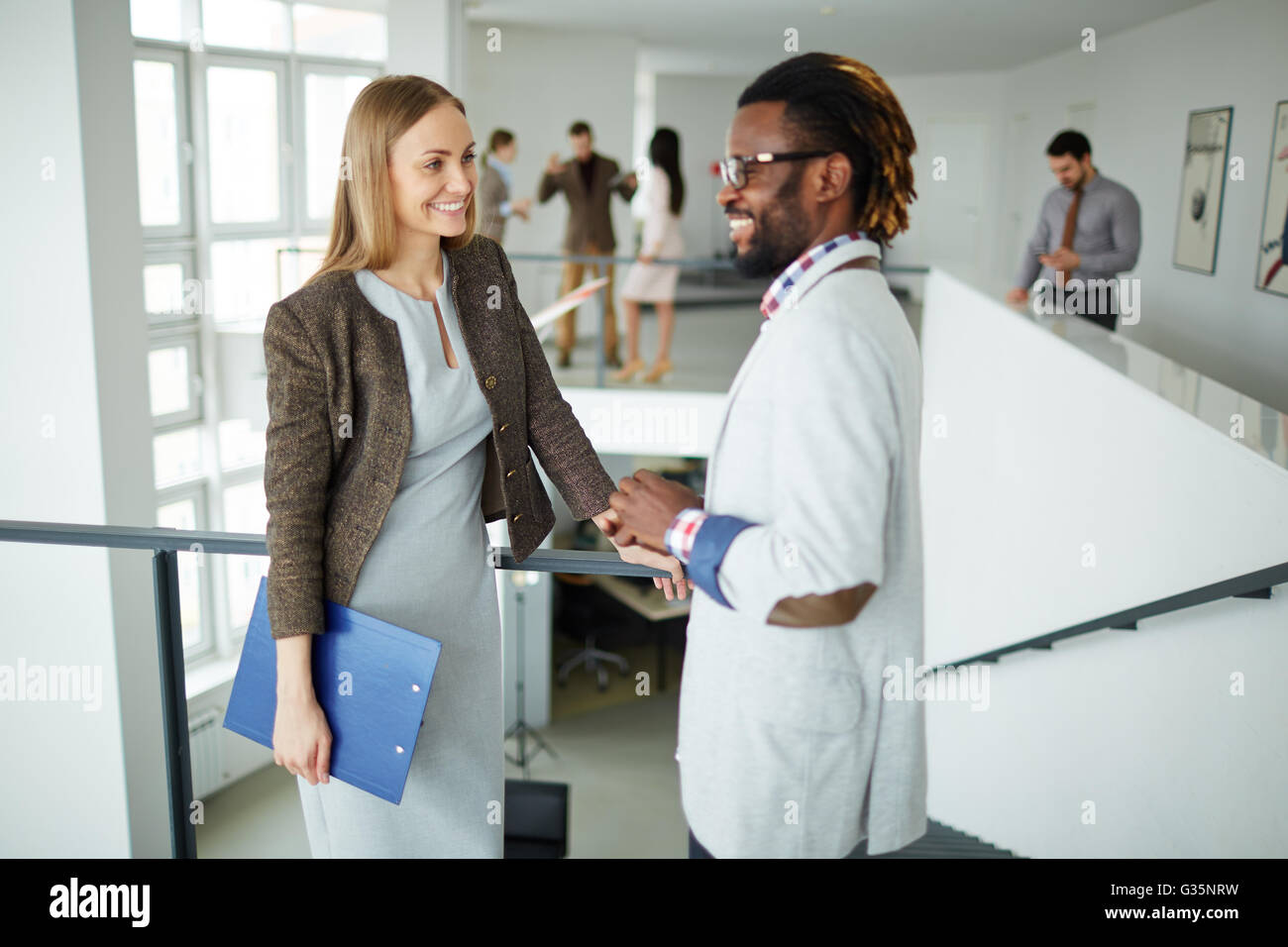 Happy business leaders hi-res stock photography and images - Alamy
