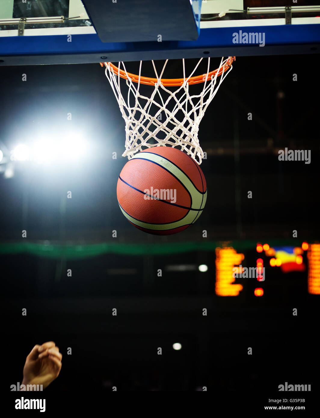 Nba basketball ball through hoop hi-res stock photography and images ...