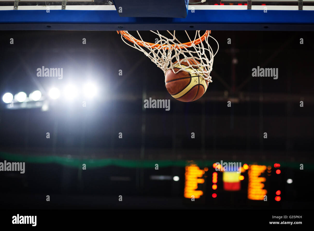 Nba basketball ball through hoop hi-res stock photography and images ...