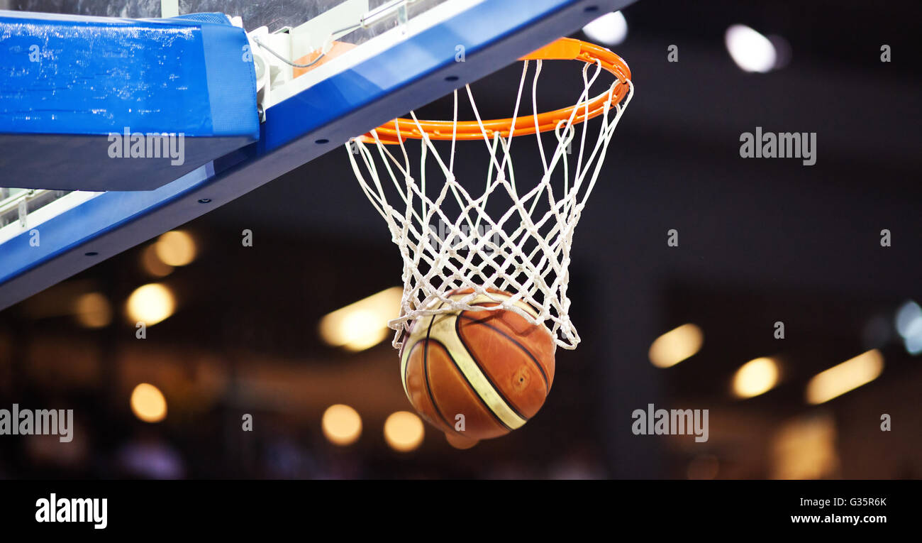 Nba basketball ball through hoop hi-res stock photography and images ...