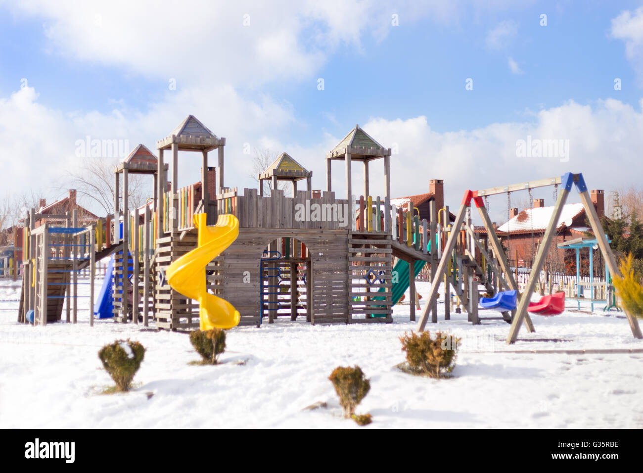 Kids’ Playground in Snow Stock Photo - Alamy