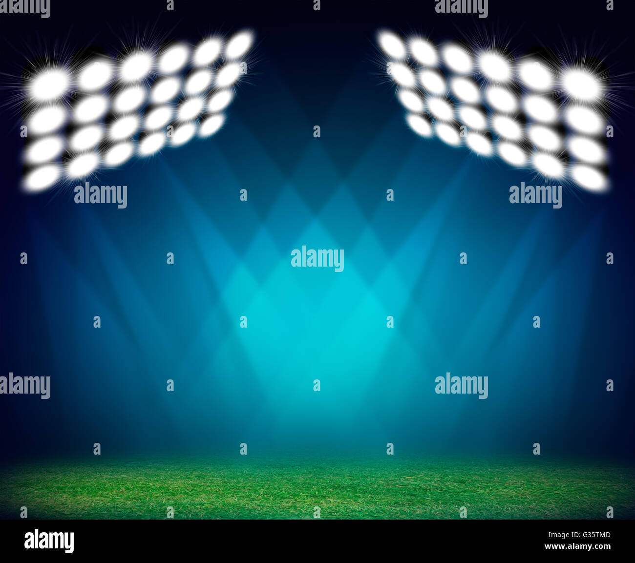 Green soccer field, illuminated spotlights Stock Photo - Alamy