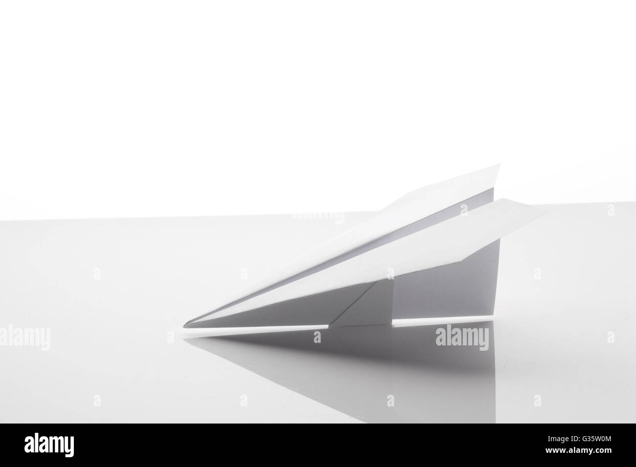 Paper airplane isolated on white background Stock Photo - Alamy