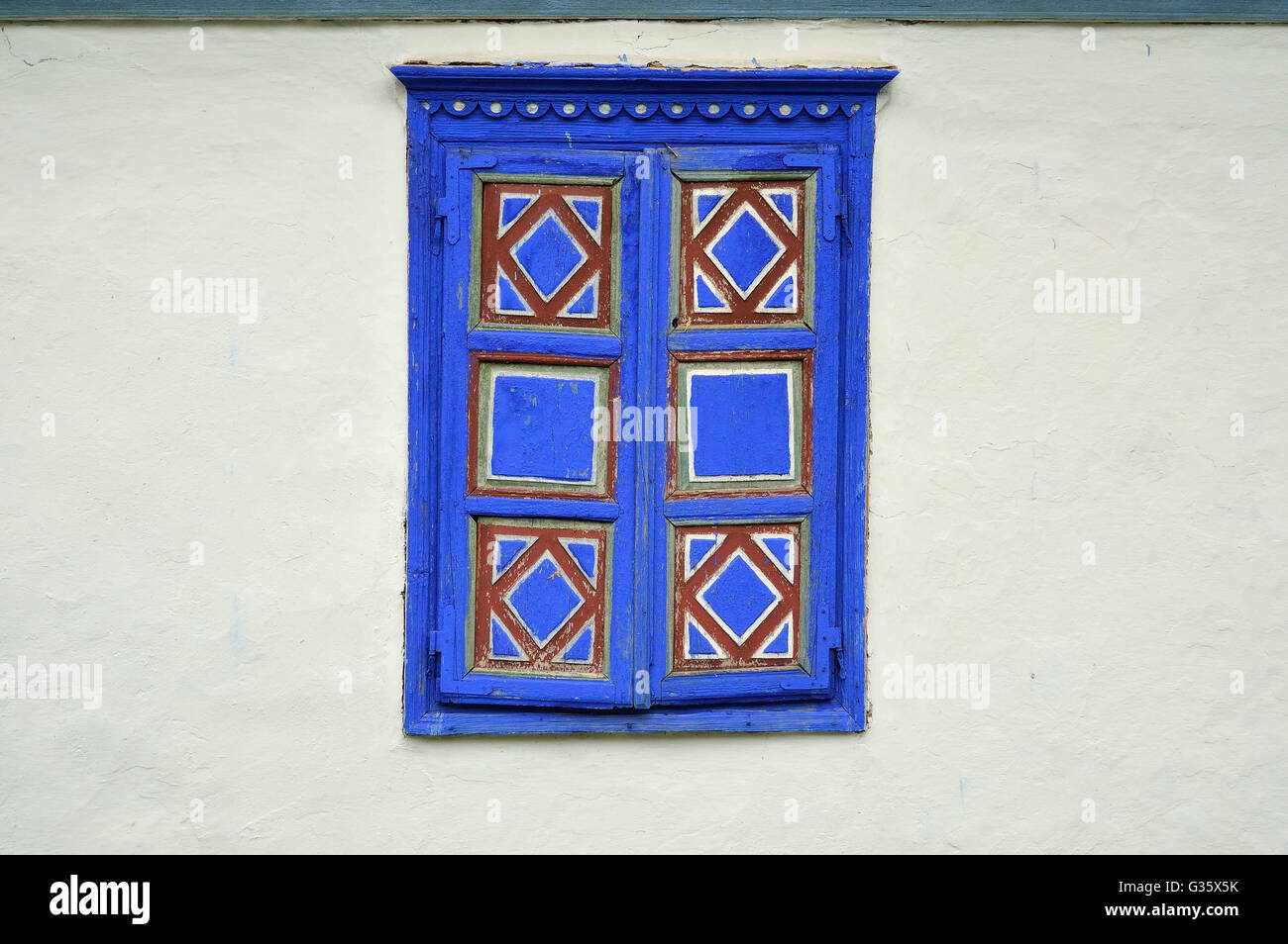 Colorful window of traditional Romanian house Stock Photo - Alamy