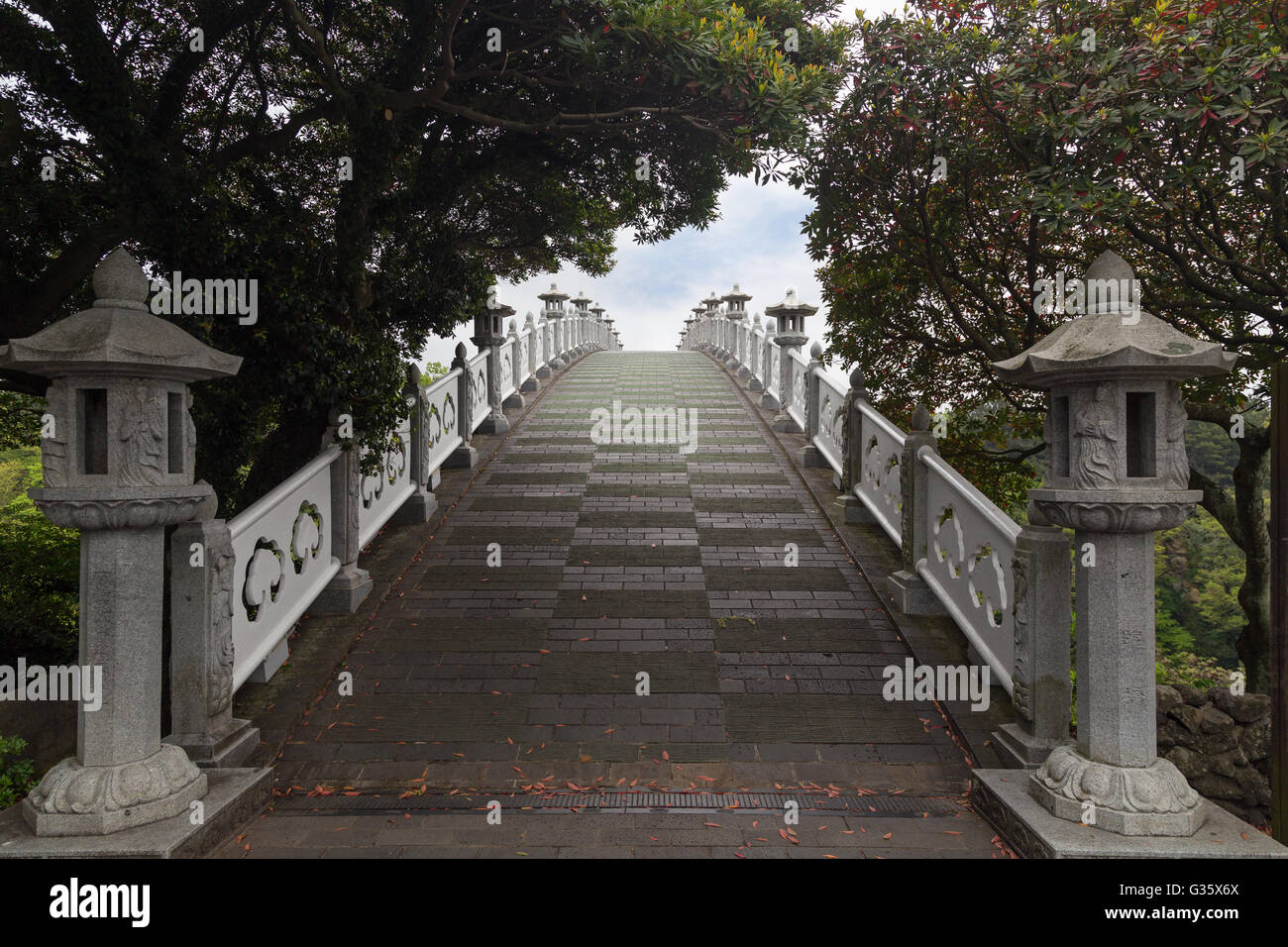 Seonimgyo Bridge near Cheonjeyeon Falls on Jeju Island in South Korea ...