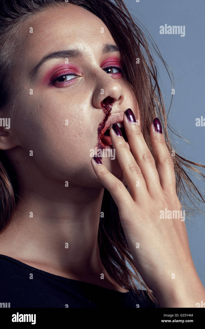Bleeding blood face angry hi-res stock photography and images - Alamy