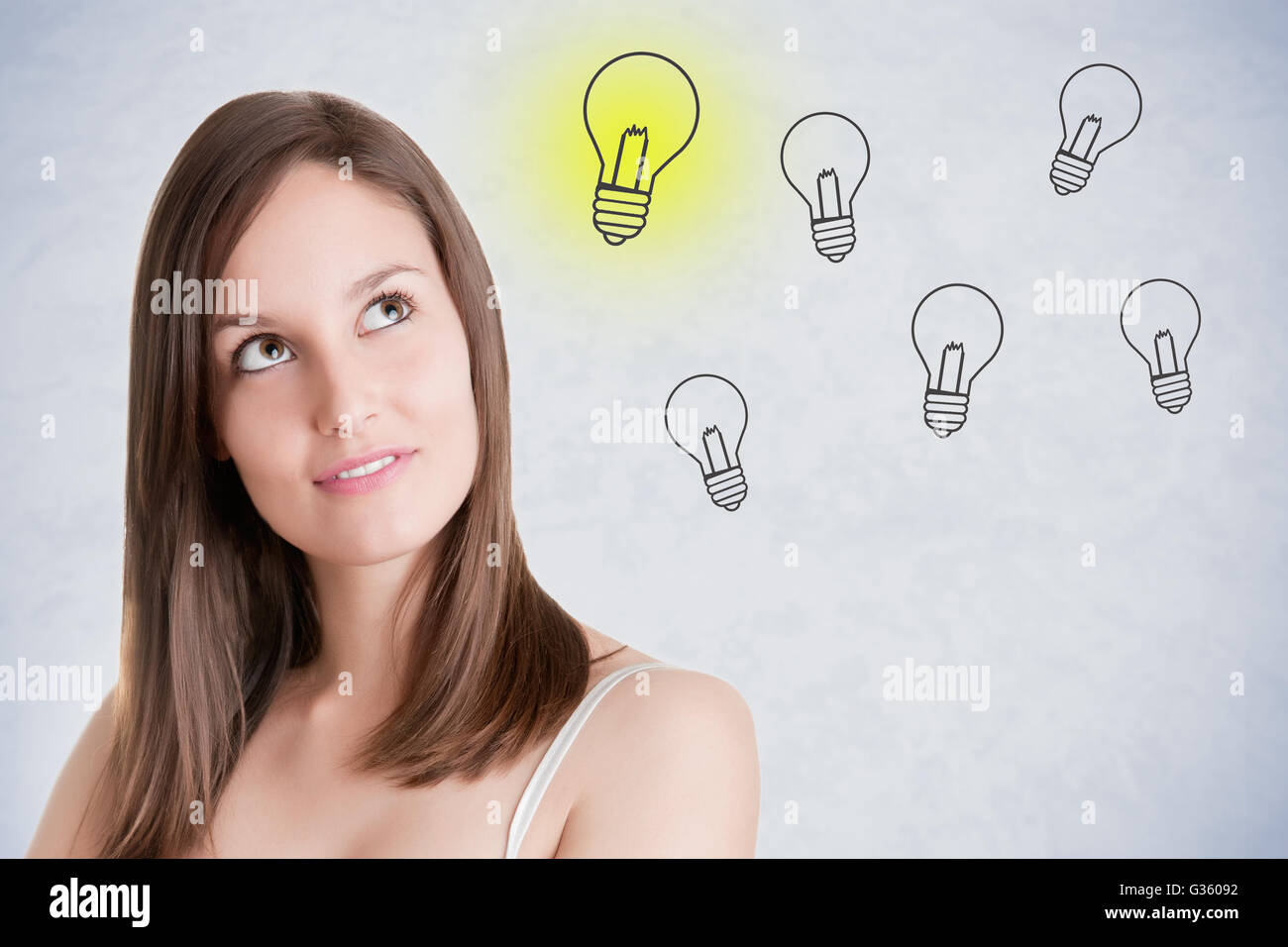 Woman thinking and having a bright idea Stock Photo - Alamy