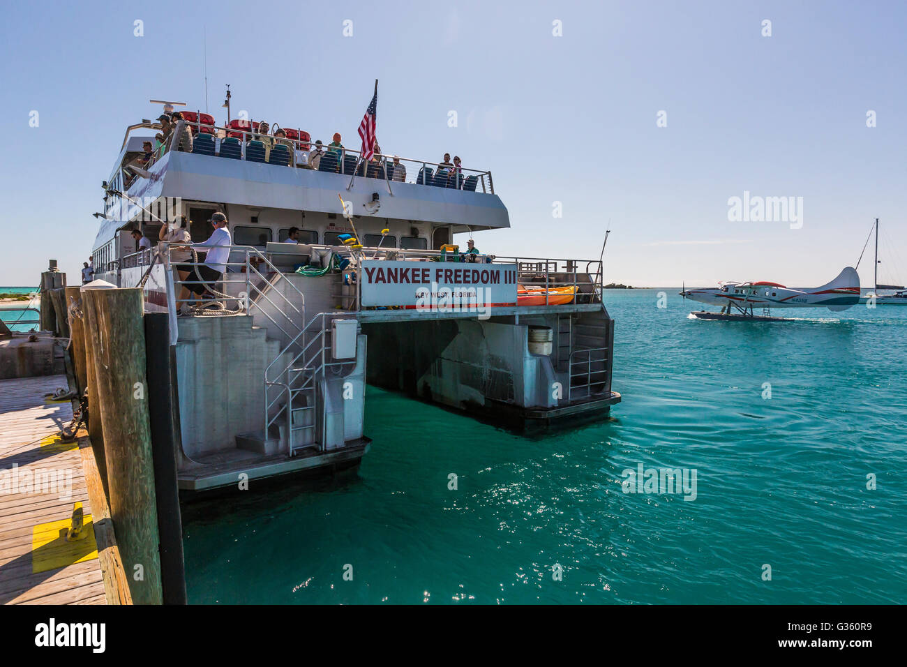 Float Plane and Yankee Freedom III, the ferry to Garden Key, arriving ...