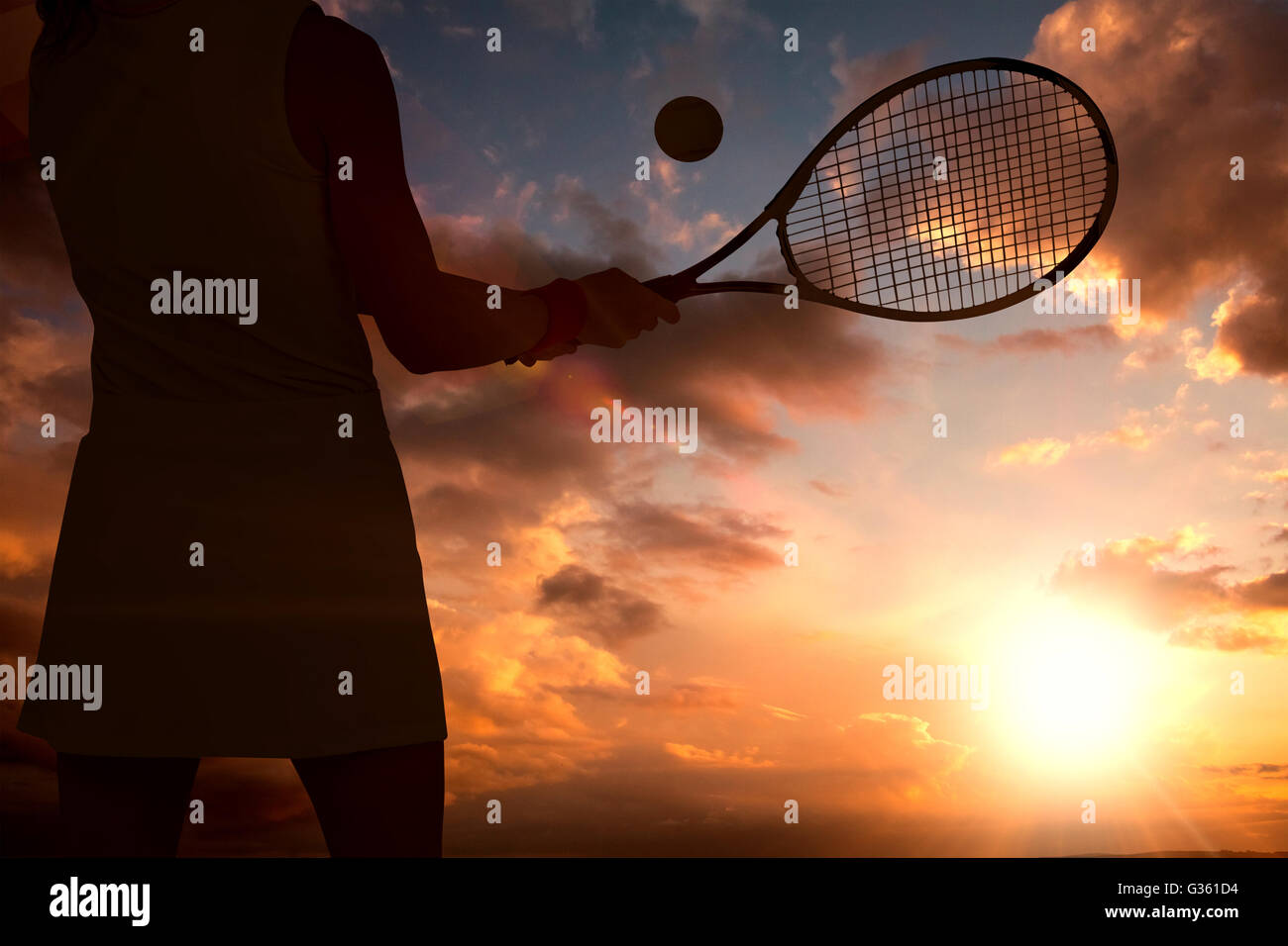 Composite image of athlete playing tennis with a racket Stock Photo - Alamy