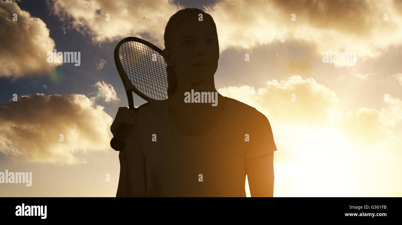 Composite image of female tennis player posing with racket Stock Photo ...