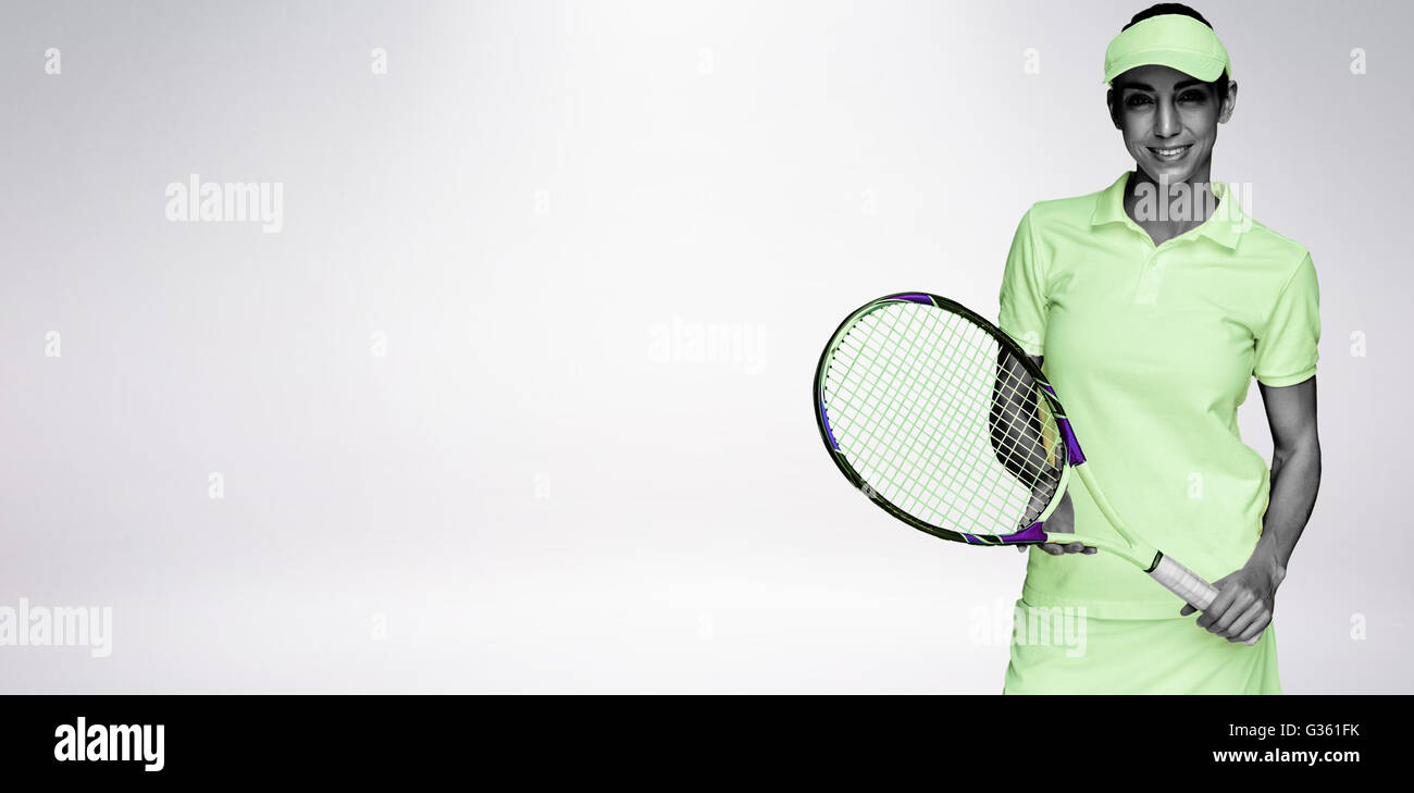 Composite image of female athlete posing with tennis racket Stock Photo ...