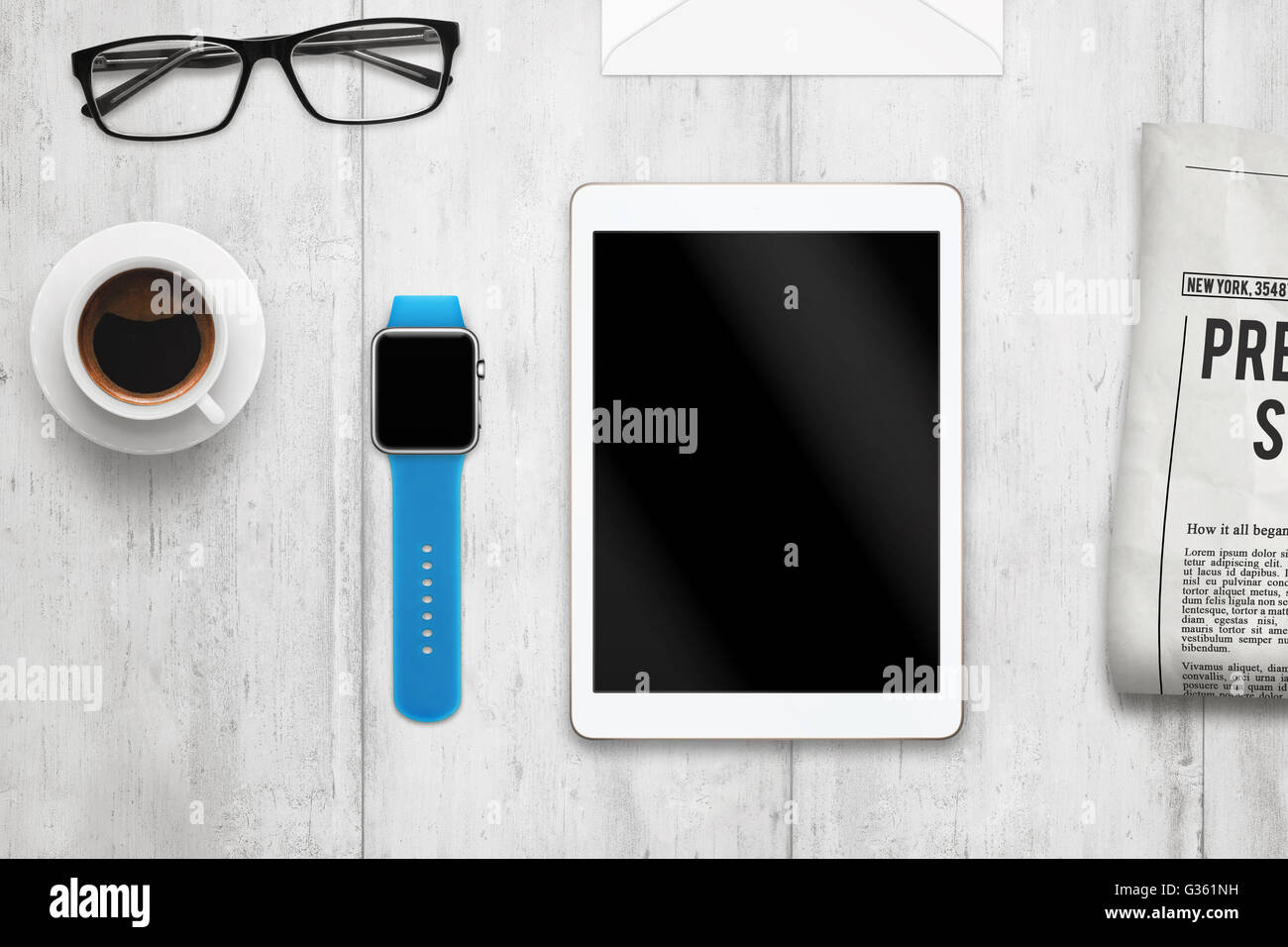 Smartwatch and tablet with isolated, blank screen for mockup. Top view ...