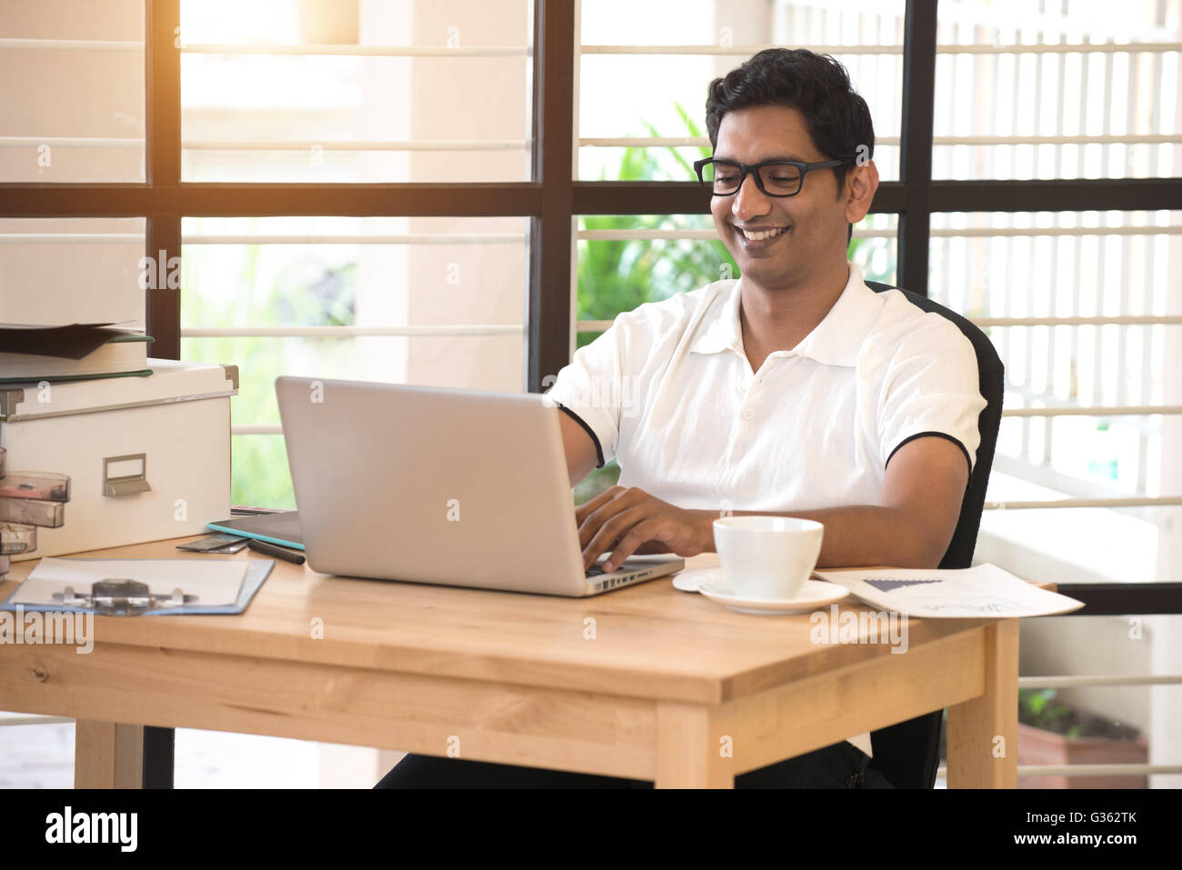 young indian man working from home office Stock Photo - Alamy