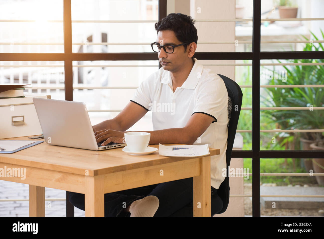 young indian man working from home office Stock Photo - Alamy