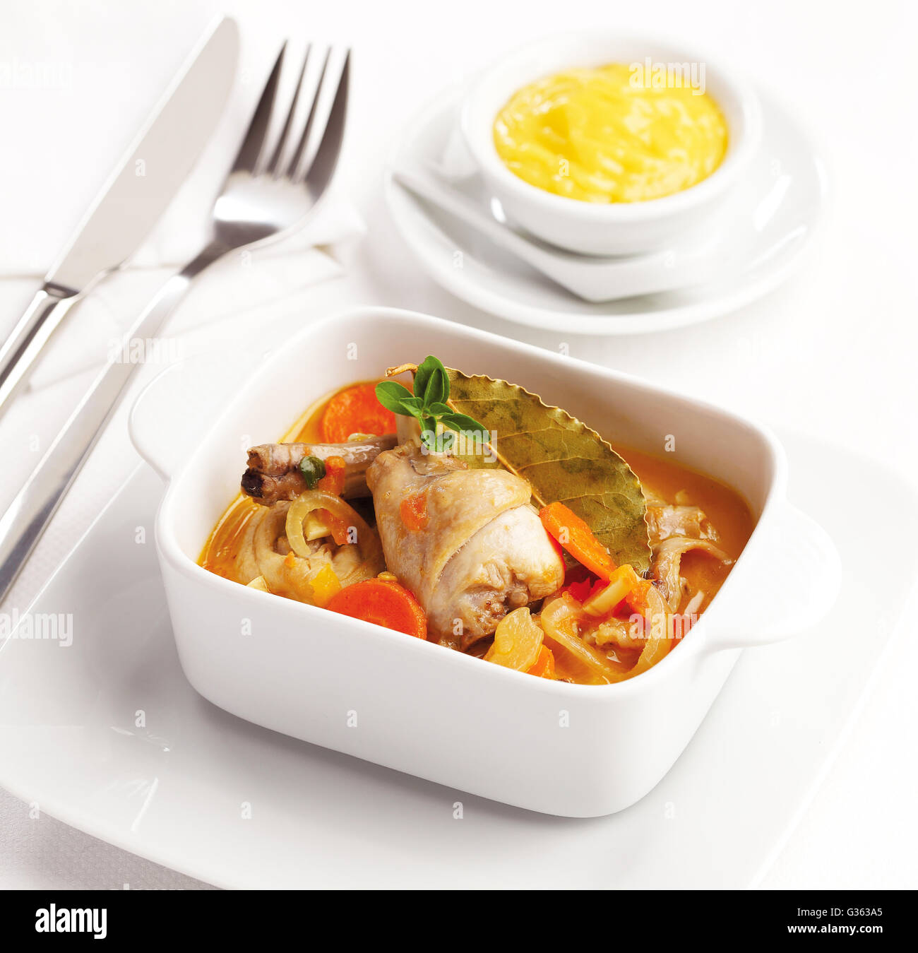 A tasty rabbit dish with a sauce of onion, carrot, garlic and bay ...