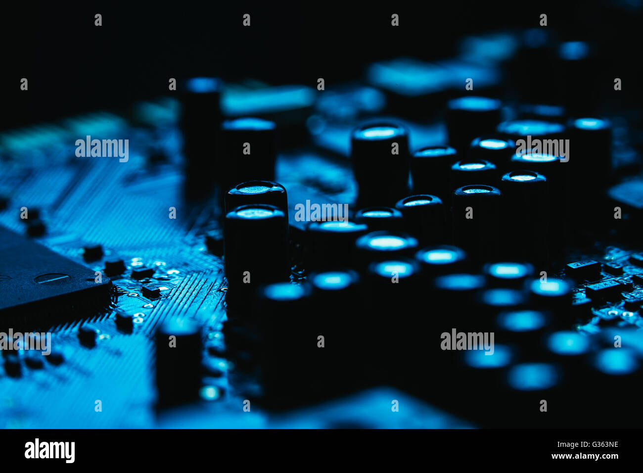 Computer motherboard closeup blue color on dark background Stock Photo ...