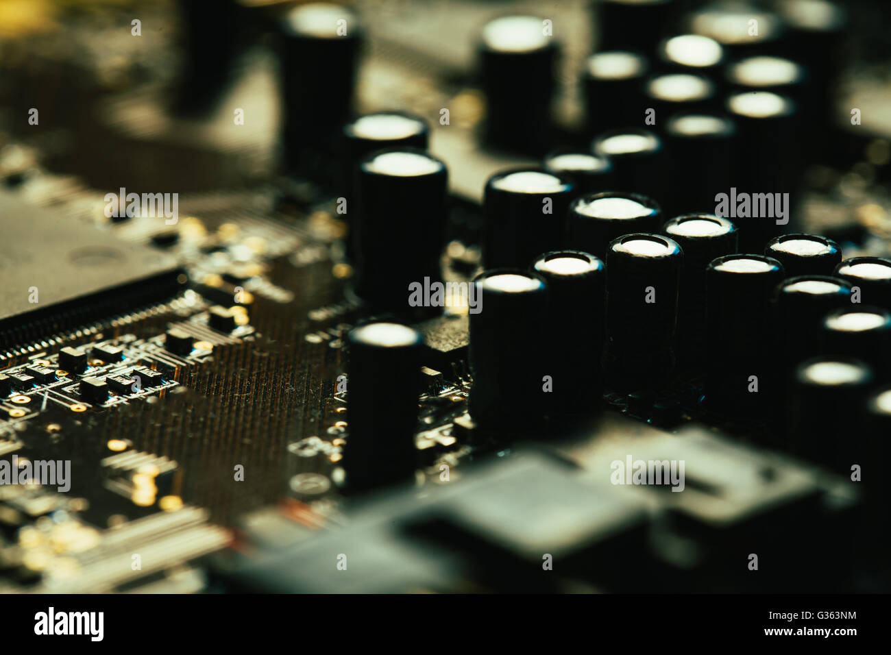 Computer motherboard closeup yellow gray color on dark background Stock ...