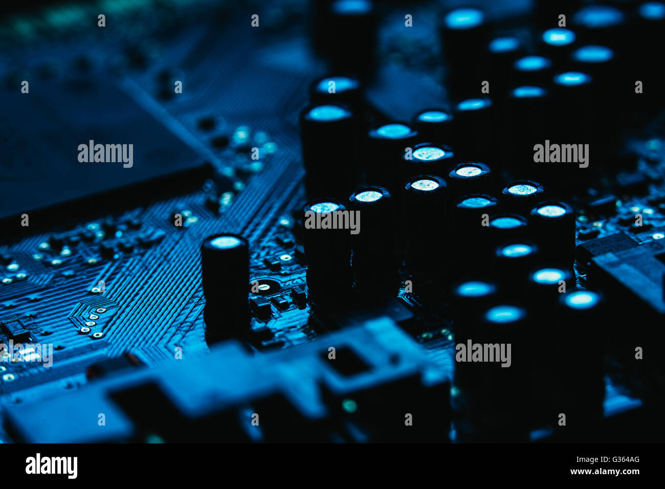 Computer motherboard closeup blue color on dark background Stock Photo ...