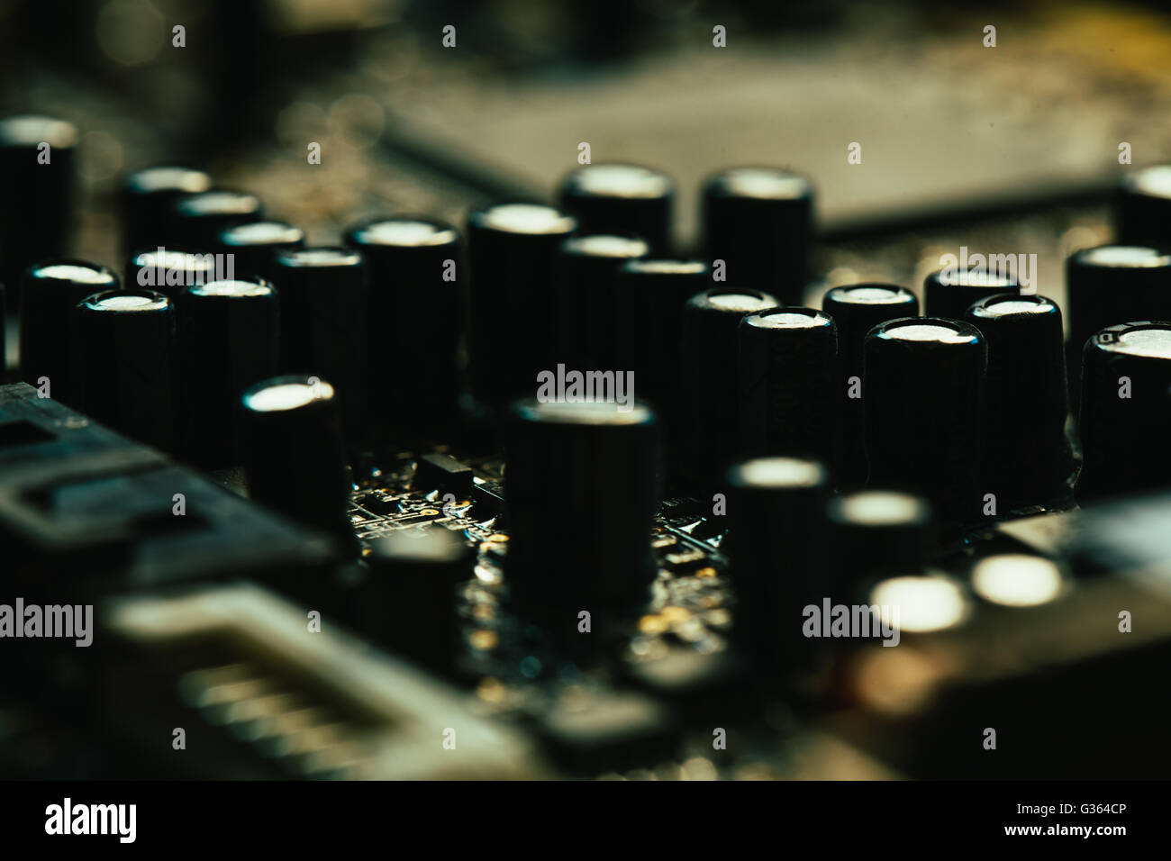 Computer motherboard closeup yellow gray color on dark background Stock ...