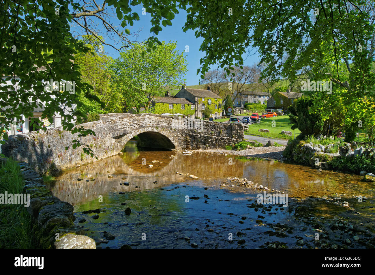 UK, North Yorkshire, Yorkshire Dales, Malham, Bridge over Malham Beck ...