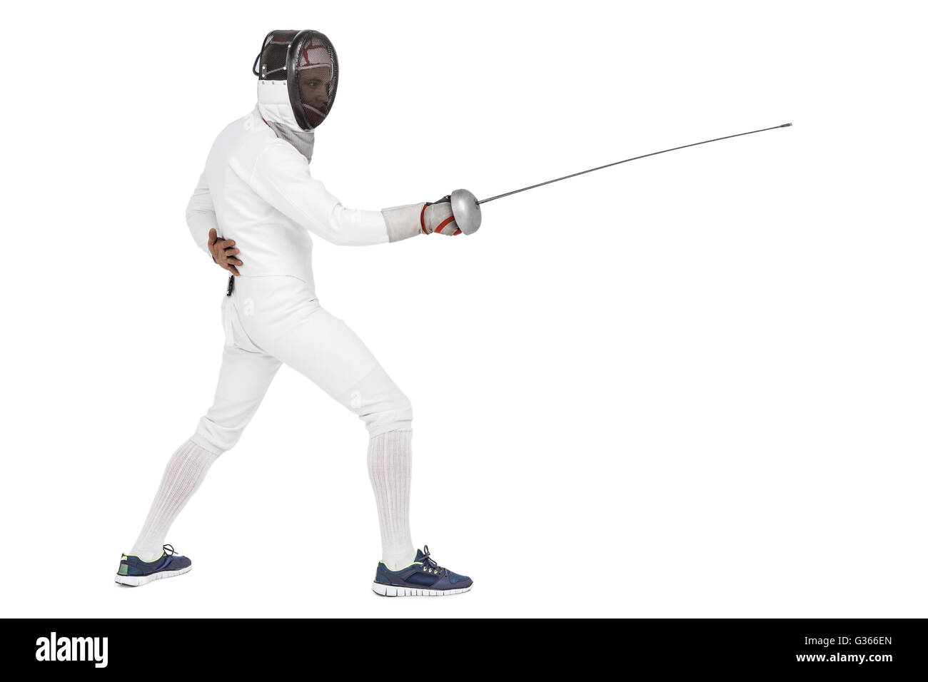 Man wearing fencing suit practicing with sword Stock Photo - Alamy