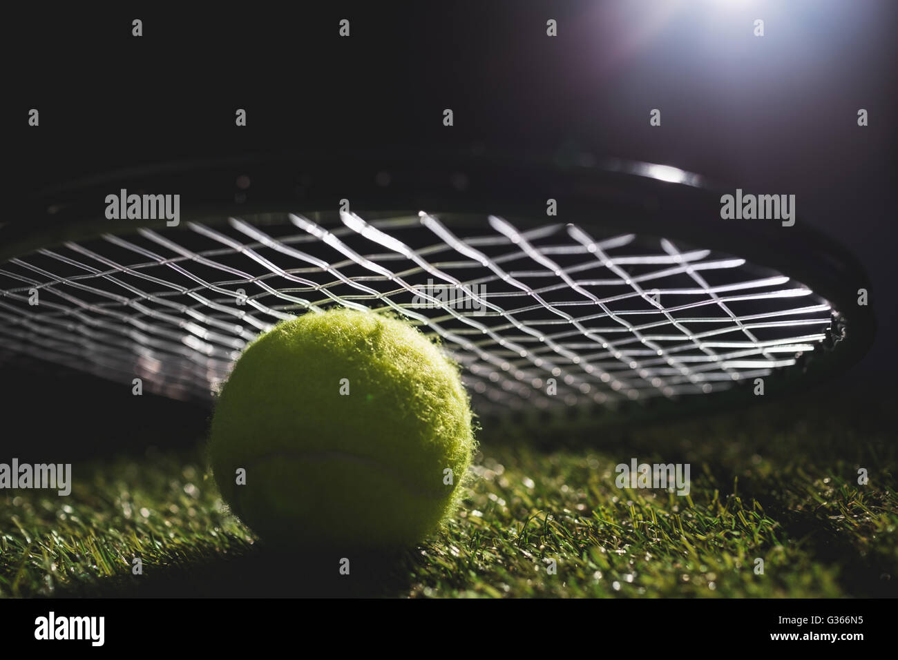 Close up of tennis ball with racket Stock Photo - Alamy