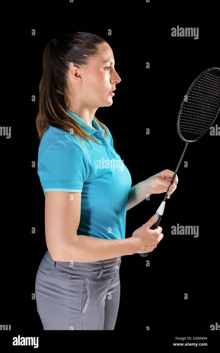 Female athlete holding badminton racket Stock Photo - Alamy