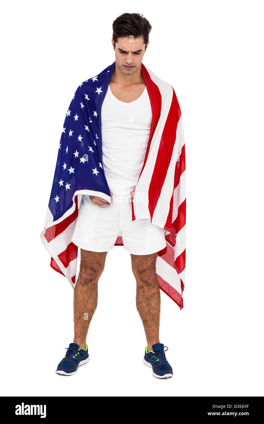 Athlete with american flag wrapped around his body Stock Photo - Alamy