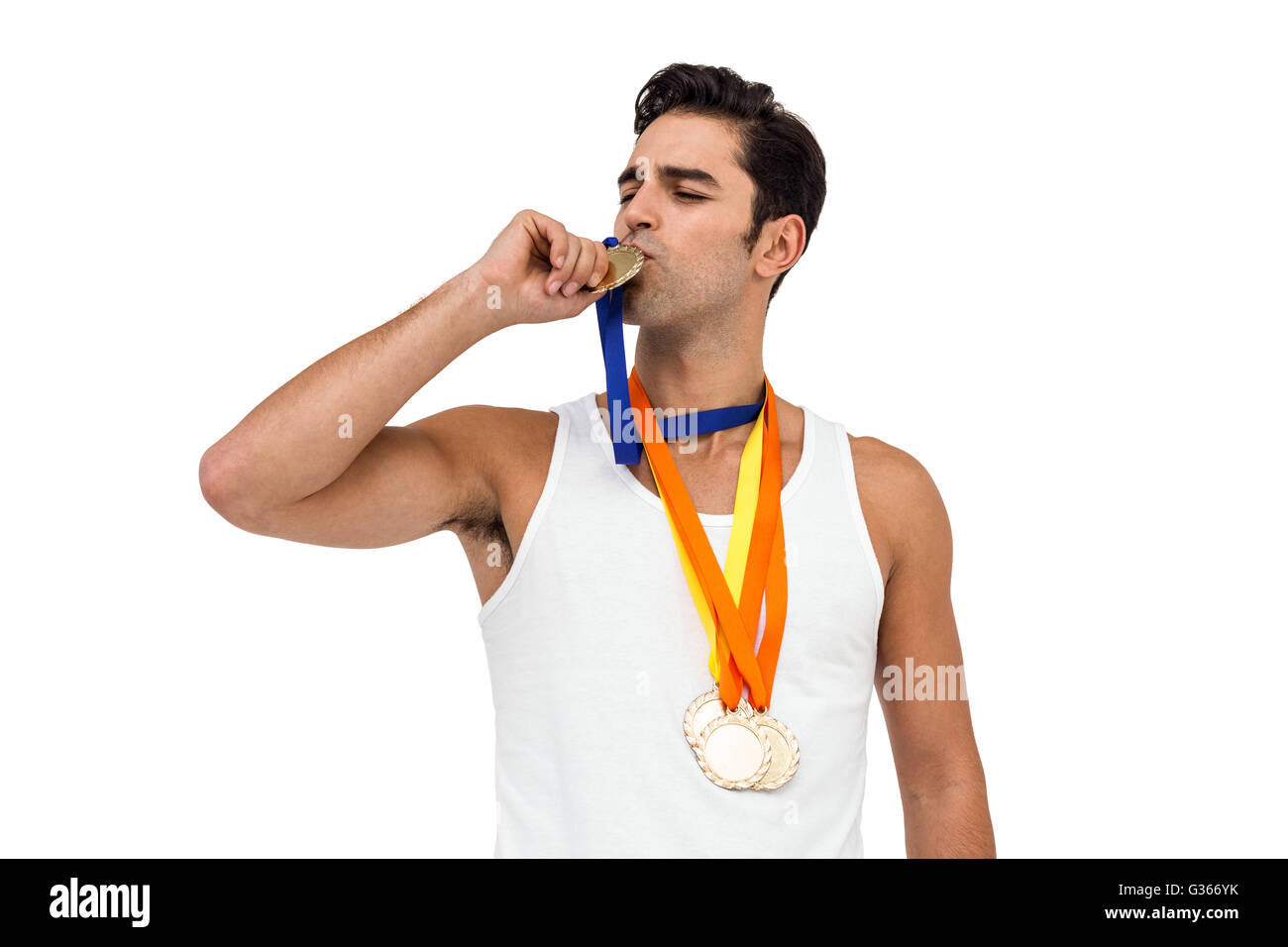 Happy athlete kissing medal Stock Photo - Alamy