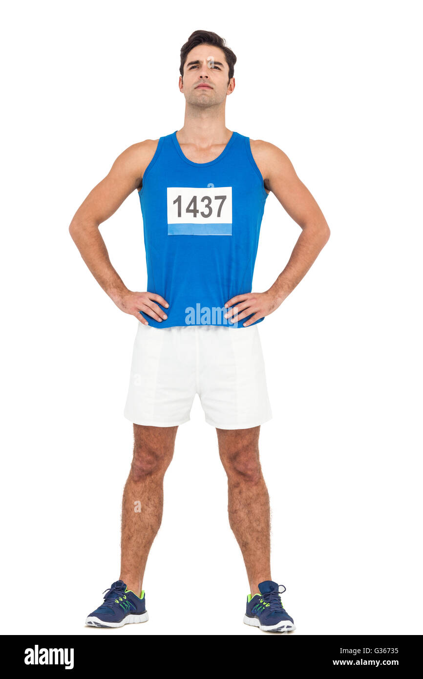 Male athlete standing on white background Stock Photo - Alamy