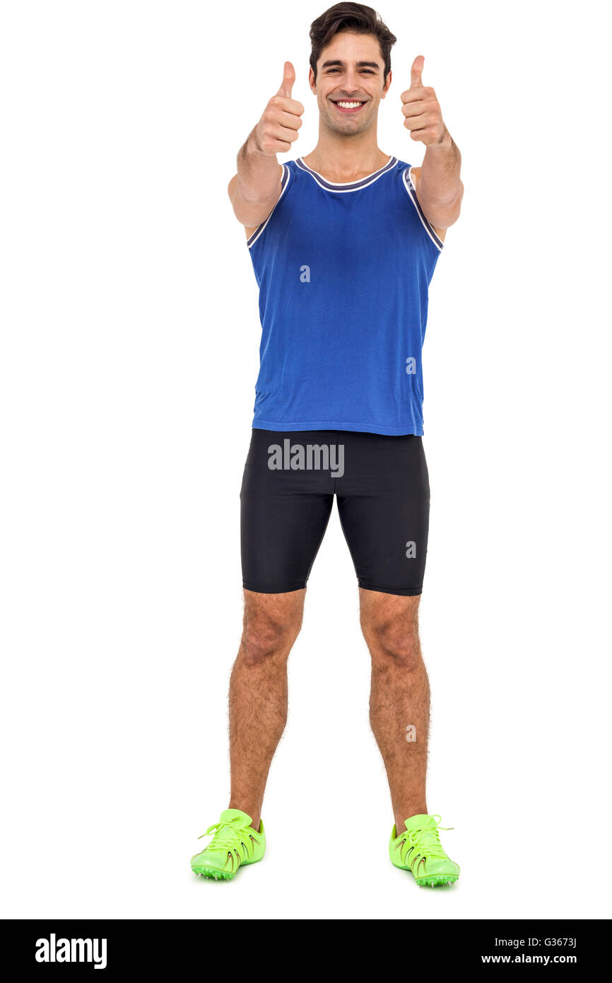 Portrait of confident athlete smiling and showing thumbs up Stock Photo ...