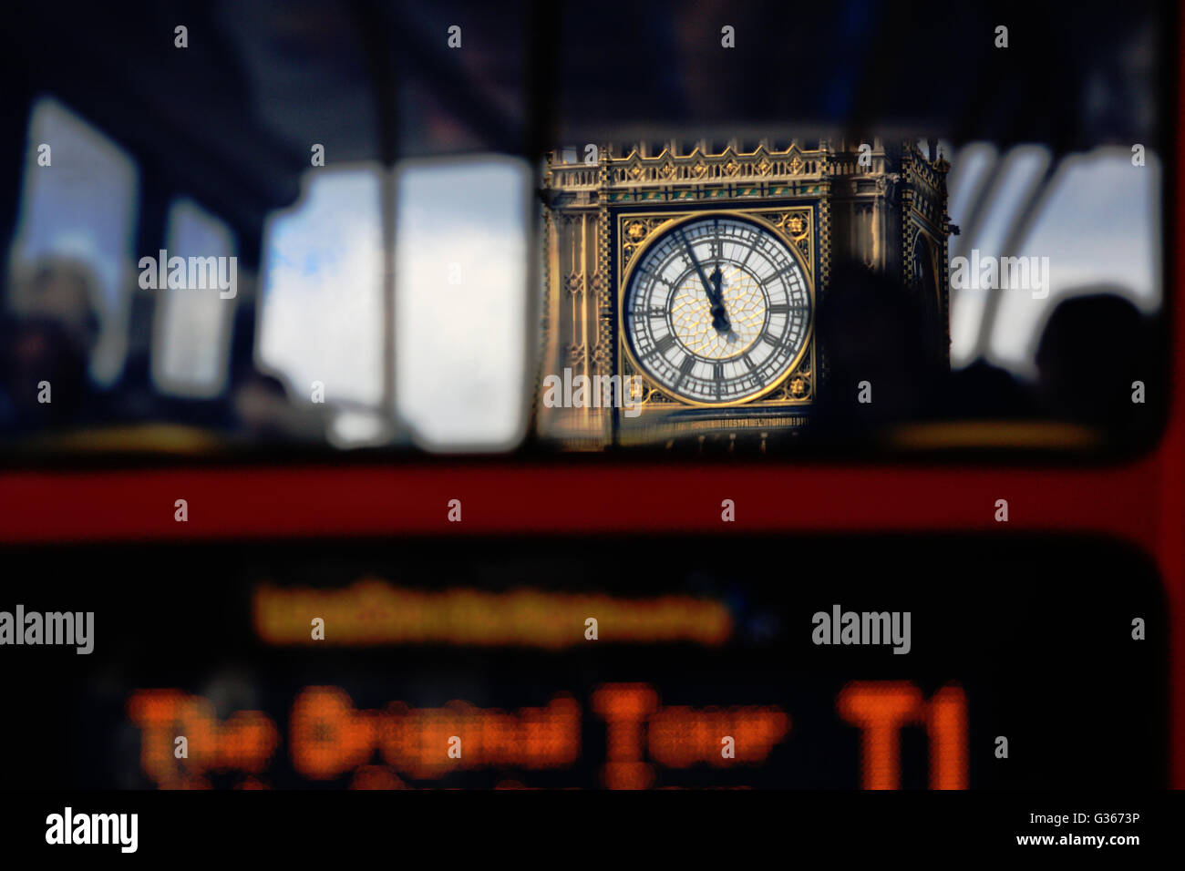 A vew, through a London tour bus, of the clock on Elizabeth Tower (Big ...