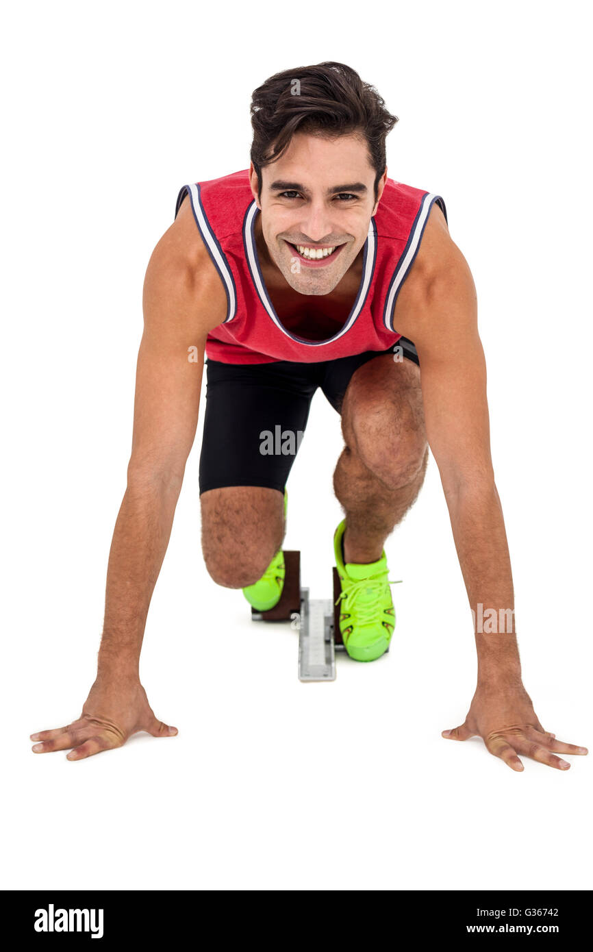 Portrait of athlete man in ready to run position Stock Photo - Alamy