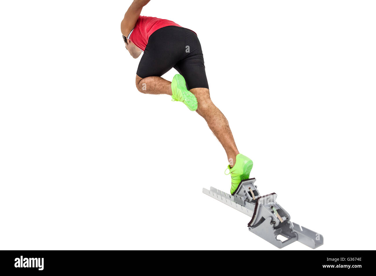 Male athlete running from starting blocks Stock Photo - Alamy