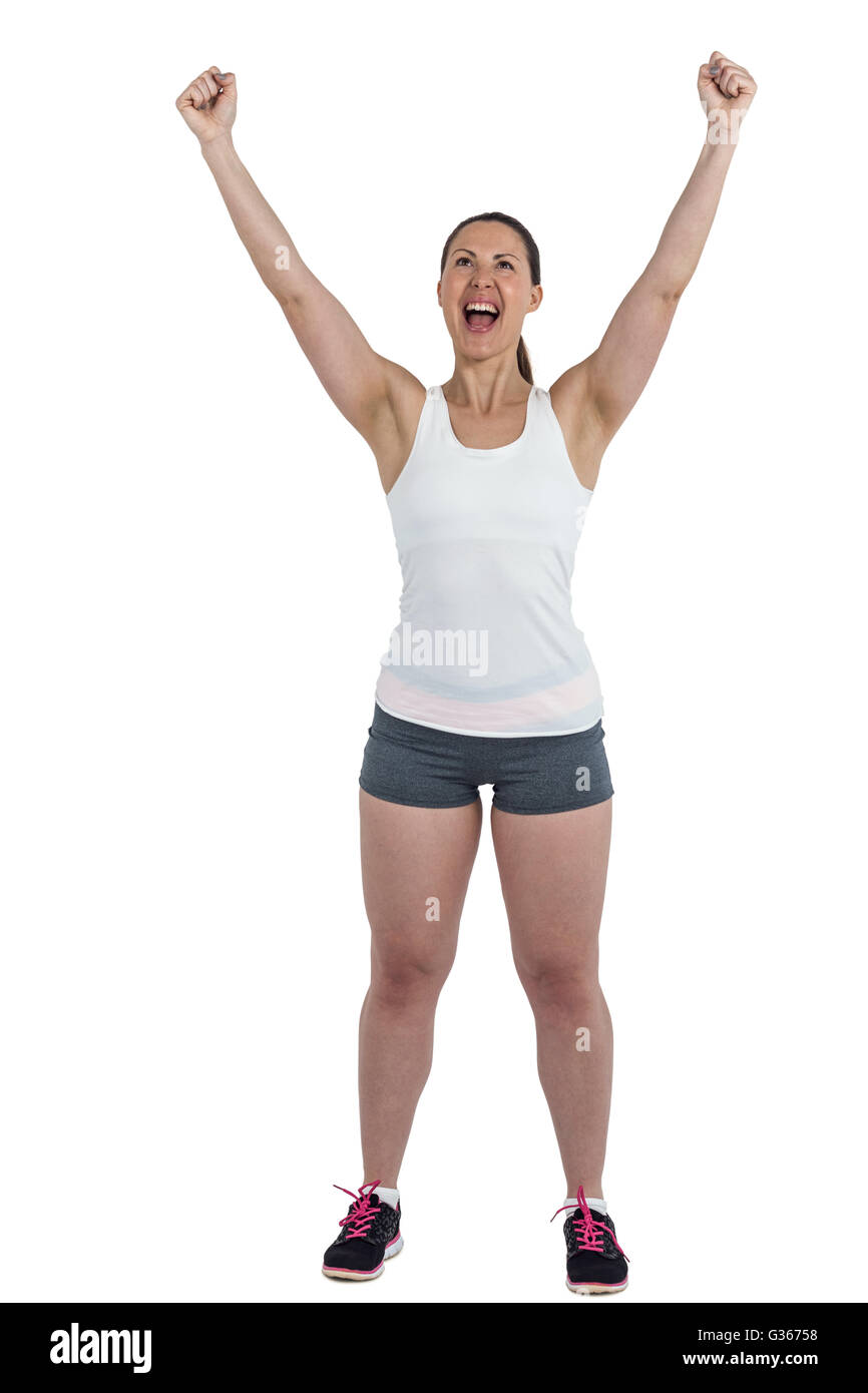 Female athlete posing after victory Stock Photo - Alamy