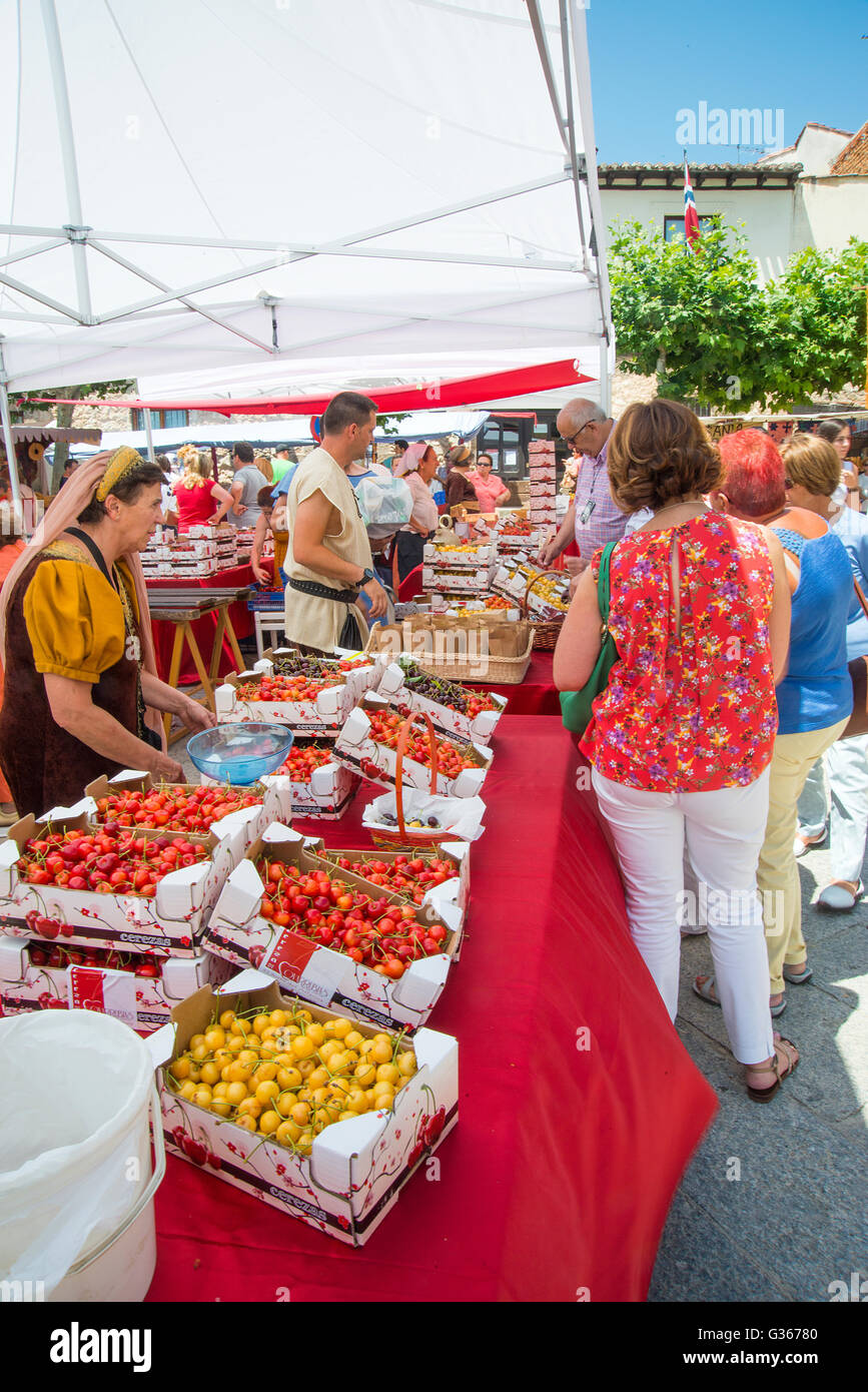 Vendor stall selling cherries. Medieval flea market, Main Square ...