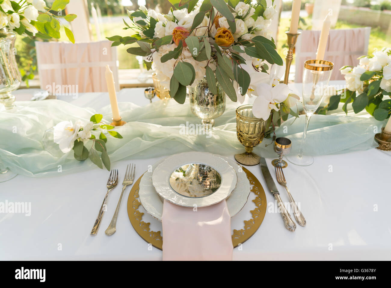 beautifully decorated table with flowers Stock Photo - Alamy