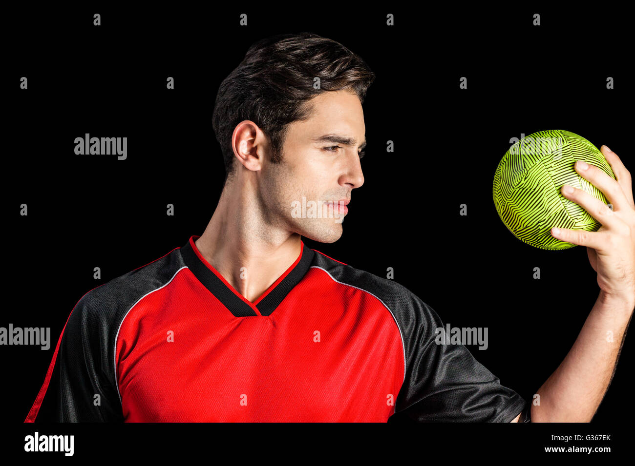 Black man holding a ball hi-res stock photography and images - Alamy