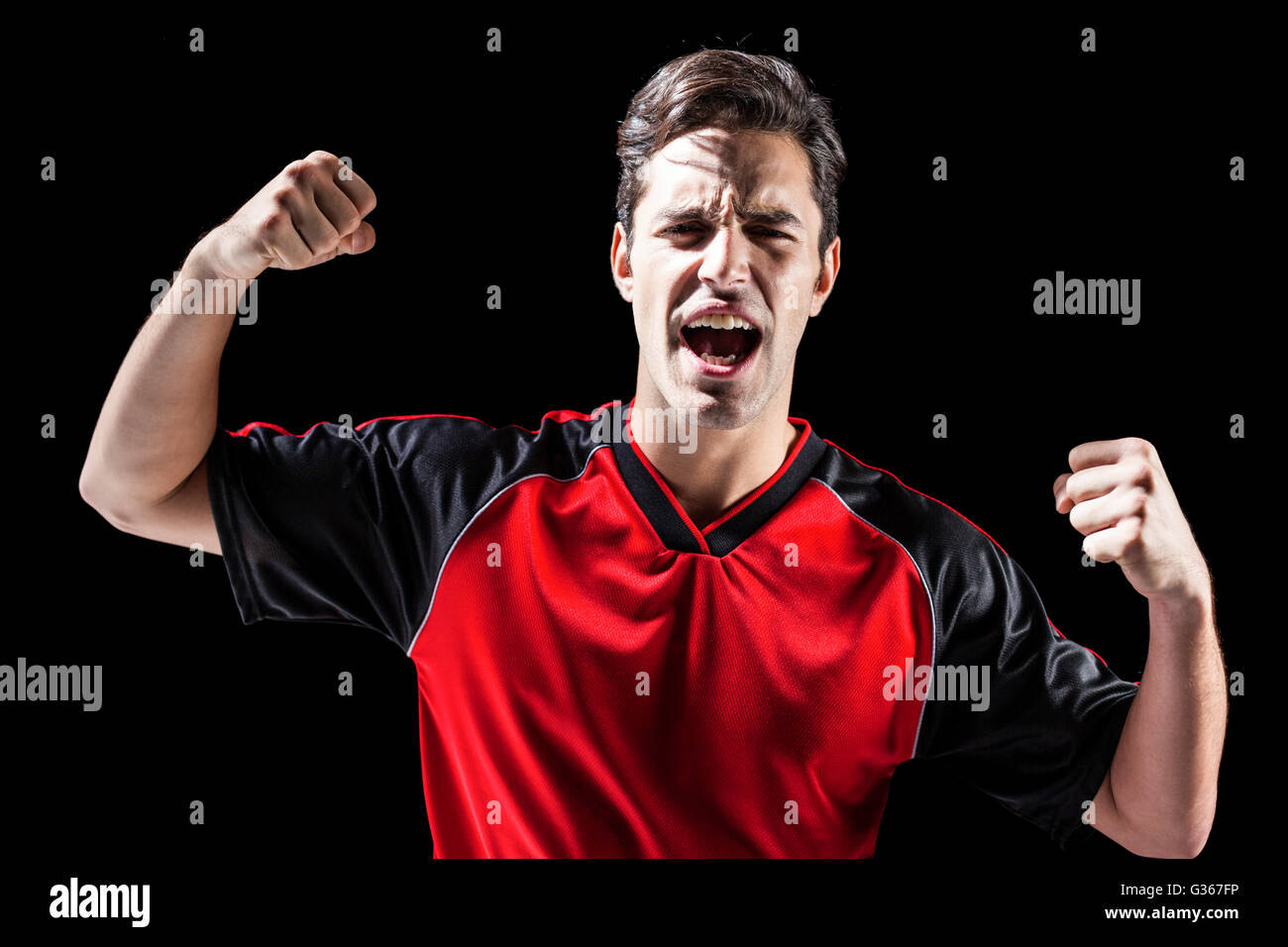 Male athlete posing after victory Stock Photo - Alamy