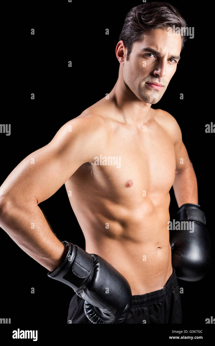 Portrait of boxer standing with boxing gloves Stock Photo - Alamy
