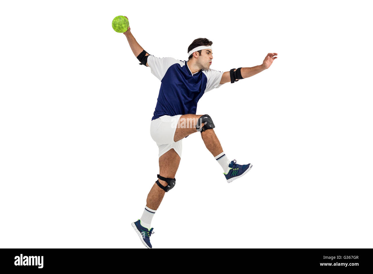 Sportsman throwing a ball Stock Photo - Alamy