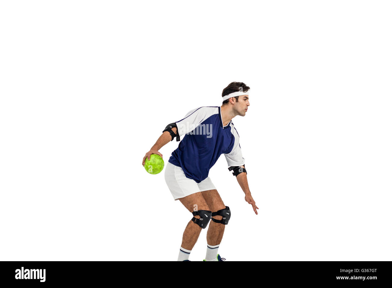 Sportsman throwing a ball Stock Photo - Alamy